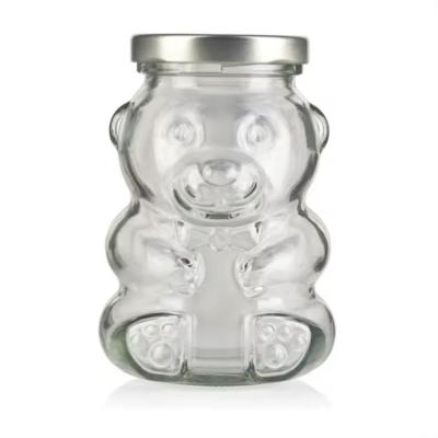 China Honey Jar Empty Glass Bottles Bear Shaped Candy Sugar Jar for sale