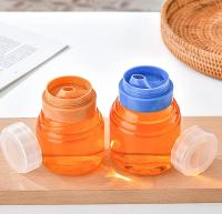 China 350ml 500ml Honey Glass Bottle Food Grade Tip Cap Round Honey Canned Sub Bottle for sale