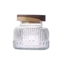 China Embossed Sealed Glass Jar Kitchen Dried Fruit And Grain Food Container for sale