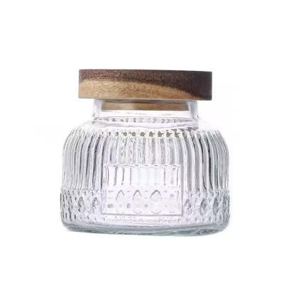 China Embossed Sealed Glass Jar Kitchen Dried Fruit And Grain Food Container for sale
