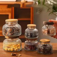 China Embossed Sealed Glass Jar Kitchen Dried Fruit And Grain Food Container for sale