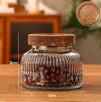 China Embossed Sealed Glass Jar Kitchen Dried Fruit And Grain Food Container for sale