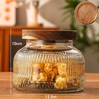 China Embossed Sealed Glass Jar Kitchen Dried Fruit And Grain Food Container for sale