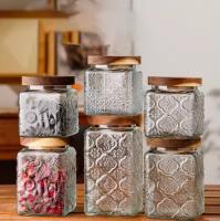 China Retro Embossed 500ml 1L Square Airtight Storage Jar Sealed Glass Container With Acacia Wooden Lid for sale