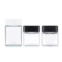 China Empty Smell Proof Child Resistant Container 60ml Child Proof Square Glass Jar With CRC Lid for sale
