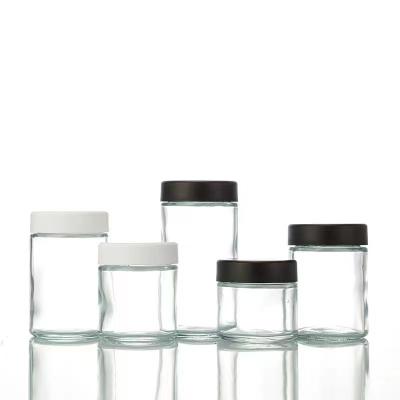 China Clear Smell Proof Jars Food Storage Container Wide Mouth Airtight Clear Empty Glass Jars With Black Caps Wholesale for sale