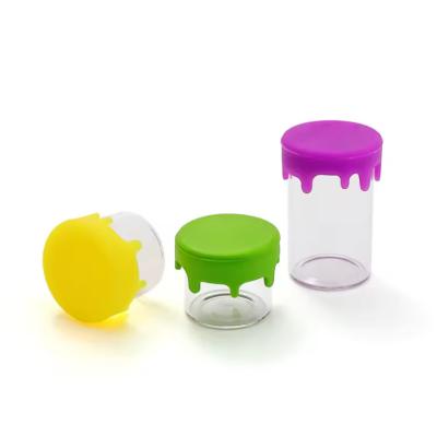 China 5ml 10ml Mini Silicone Jar Wax Small Glass Container Concentrate Acrylic Storage Glass Jar With Silicone Lids for sale