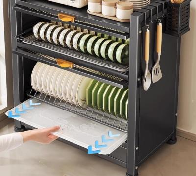 China Sealed Door Multi Functional Kitchen Storage Rack With Food Grade PP Material For Efficient Draining And Organized Countertops for sale