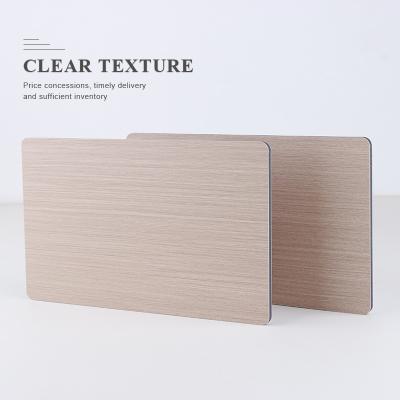 China 5mm 8mm Waterproof PVC Wall Panel Bamboo Charcoal Wood Veneer for sale