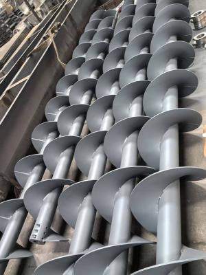China DSZ Type Single Shaft Spiral Humidifying Mixer Utilizing Manganese Steel Screw Blade for sale