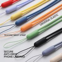 China Short Elastic Cell Phone Wrist Lanyard Strap Silicone Usb Selfie Stick OEM for sale