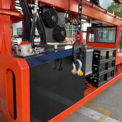 China Electric Straddle Carrier 35T Capacity 3200mm Width with Telescopic Lifting and Battery Power for sale