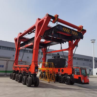 China 80T Industrial Straddle Carrier Truck with 5km/h Speed and 12000mm Turning Radius for Heavy Cargo Handling for sale