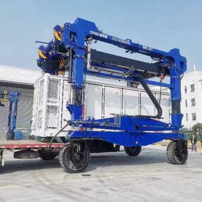 China Q355 Steel Electric Straddle Carrier - 4-Container Stacking Height Hydraulic Lifting Vehicle for Port Operations for sale