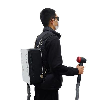 China Pulse laser rust cleaning machine Backpack 100w coating and paint removal hand-held laser cleaning machine for sale