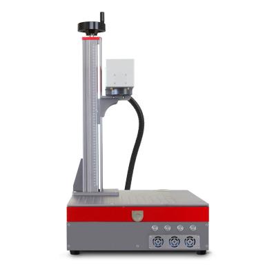 China 50W to 150W Bearing Fiber Laser Marking Machine for Gold Silver Copper Stainless Jewelry for sale