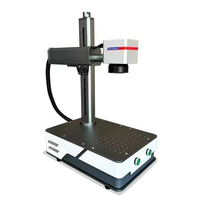 China Portable Mini 20W 100W JPT Raycus Fiber Laser Engraving Machine for Guns Jewelry for sale