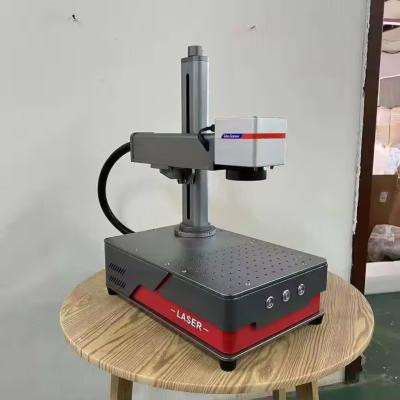 China Portable 20W 50W MOPA Fiber Laser Marking Machine 20KG Metal Engraving 110x110mm for sale