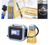 China 30W Handheld Laser Marking Machine for Metal Engraving Logo QR Text Nameplate Air Cooling for sale