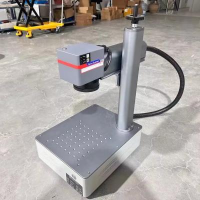 China 20W 30W Mini Portable Fiber Laser Engraving Machine for Metal Plastic Gold Silver Jewelry for sale