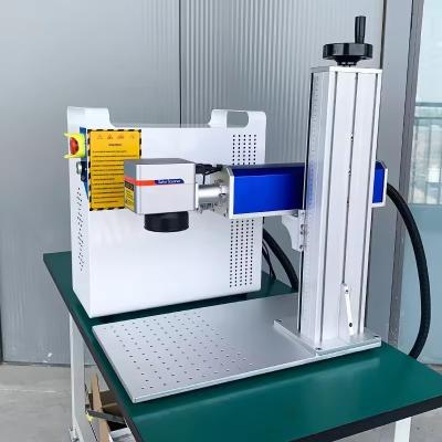 China 30kg Mini Split Fiber Laser Metal Marking Machine 20W 30W 50W Pulsed for sale