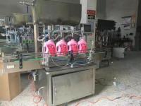 China Four Nozzles Automatic Liquid Filling Machine , Automatic Bottle Filling Machine for sale