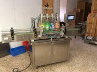 China Four Nozzles Automatic Liquid Filling Machine , Automatic Bottle Filling Machine for sale