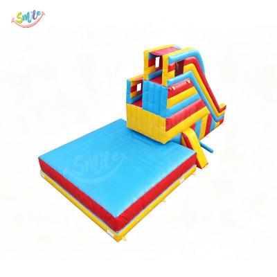 China Commercial Grade Inflatable Stunt Jump with Big Airbag Landing Pad Climbing Slide for Party Rental Business for sale