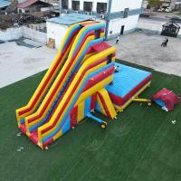 China Commercial Grade Inflatable Stunt Jump with Big Airbag Landing Pad Climbing Slide for Party Rental Business for sale