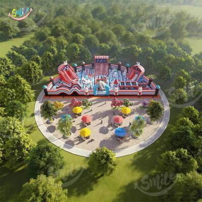 China Large Inflatable Playground Park Red White Blue Theme With Slides And Climbing Games For Kids Carnival Party for sale