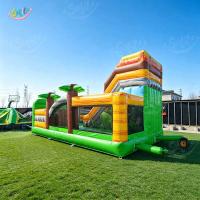 China Tropical Palm Tree Inflatable Obstacle Course Commercial Grade Double Slide Bouncy Castle For Party Rental Event（YKH066） for sale