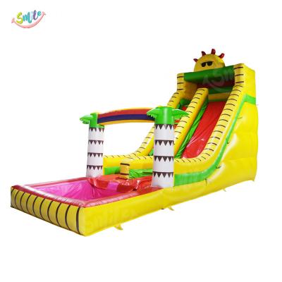 China Commercial Grade Inflatable Tropical Water Slide With Pool Palm Tree Theme Party Rental PVC Bouncer Slide For Kids（YKW100) for sale