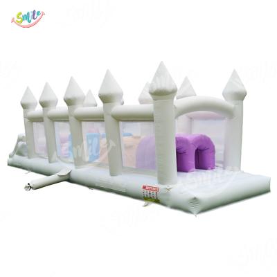 China Elegant White Wedding Inflatable Obstacle Course Giant Macaron Bouncy Castle For Kids Party Event Outdoor Rental（YKO049) for sale