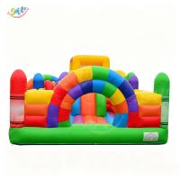 China Giant Inflatable Obstacle Course with Slide Commercial Grade Colorful Rainbow Bouncer Jumping Castle for Rental Business(YKF052) for sale