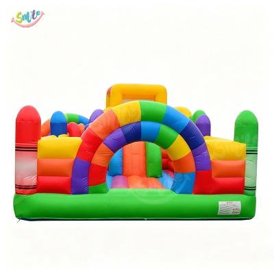 China Giant Inflatable Obstacle Course with Slide Commercial Grade Colorful Rainbow Bouncer Jumping Castle for Rental Business(YKF052) for sale