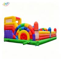 China Giant Inflatable Obstacle Course with Slide Commercial Grade Colorful Rainbow Bouncer Jumping Castle for Rental Business(YKF052) for sale