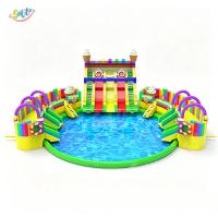 China Colorful Sweets Theme Inflatable Playground Outdoor Water Park with Double Lane Slide and Round Pool for Amusement for sale
