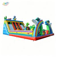 China Commercial Grade Inflatable Dinosaur Playground With Slides Rainbow Bouncer Castle Kids Party Rental Adventure Park for sale
