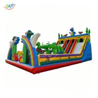 China Commercial Grade Inflatable Dinosaur Playground With Slides Rainbow Bouncer Castle Kids Party Rental Adventure Park for sale