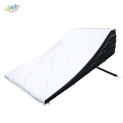 China Inflatable Slide Ramp with White Sliding Surface Black Side Walls for Outdoor Events and Party Rental(YKG310) for sale