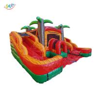 China Palm Tree Theme Inflatable Bounce House with Two Slides and Enclosed Play Space for Kids Outdoor Events for sale