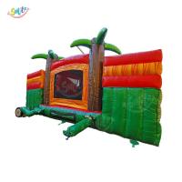 China Palm Tree Theme Inflatable Bounce House with Two Slides and Enclosed Play Space for Kids Outdoor Events for sale