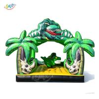China Inflatable Dinosaur Bounce House Jungle Theme Bouncy Castle with T-Rex Head and Palm Trees for Kids Party Rental for sale