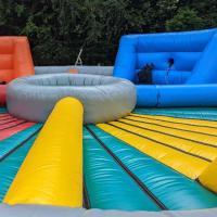 China Commercial Sport Center New Large Inflatable Human Hungry Hippos Game Interactive Bungee Jumper Blow Up Bouncer for Carnival Party Rental Event Team Building Activities for sale
