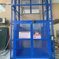 China 500kg-20000kg Industrial Elevators And Lifts Blue Freight Elevator Platform for sale