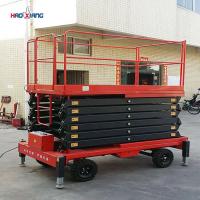 China 300kg-1500kg Mobile Scissor Lift Platform With Solid Tires And AC DC Power for sale