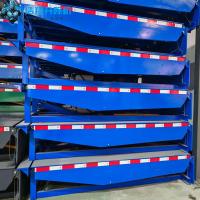 China 15T Blue Adjustable Height Hydraulic Truck Dock Leveler Loading Dock Lifts for sale