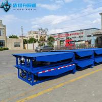 China Blue 10T Warehouse Fixed Hydraulic Dock Leveler Hydraulic Dock Ramp Adjustable Height Loading Dock for sale