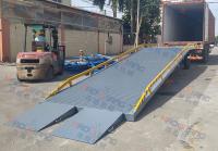 China 10 Meters 10 Tons Grey Portable Truck Dock Ramps Temporary Loading Dock Steel Loading Ramp For Enhanced Efficiency In Warehouses for sale