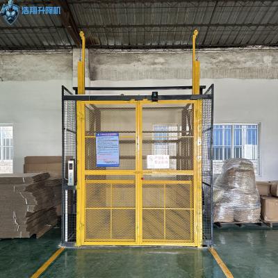 China Heavy Load Hydraulic Lift Hydraulic Cargo Lift Elevator With Emergency Stop Smooth Vertical Transport for sale